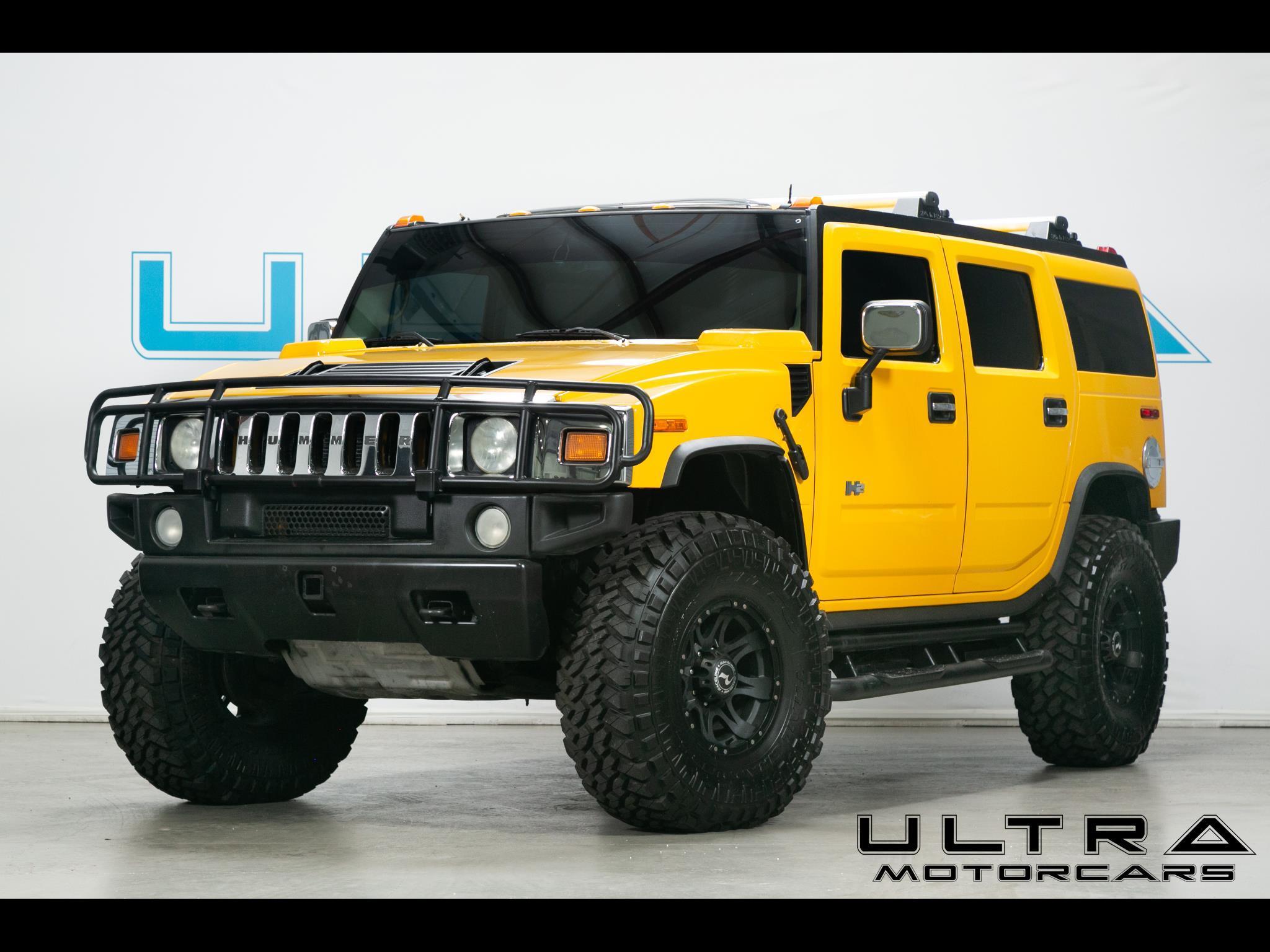 Hummer H3 Yellow Lifted